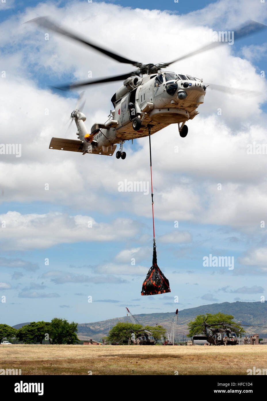 A Japan Maritime Self-Defense Force (JMSDF) SH-60K Seahawk helicopter ...