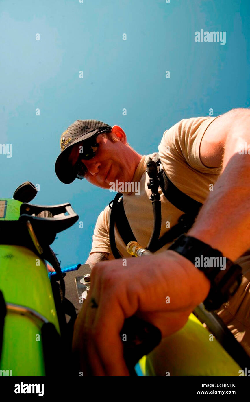 Army Diver Staff Sgt. William D'Angelo, assigned to the 544th Engineer ...