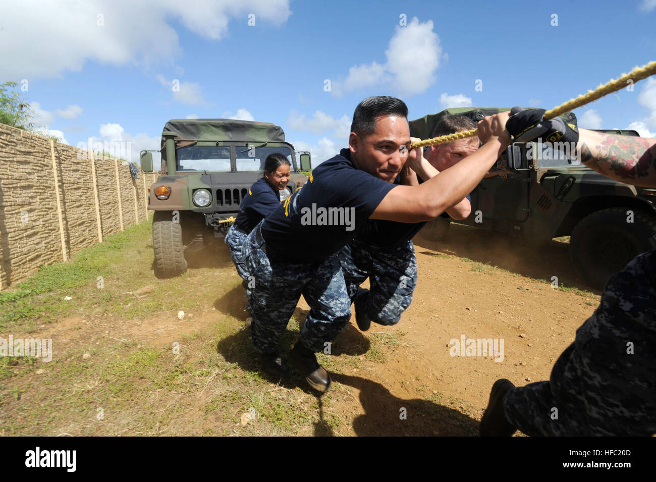 Chief Logistics Specialist (select) Marcus Burdios helps his team pull ...