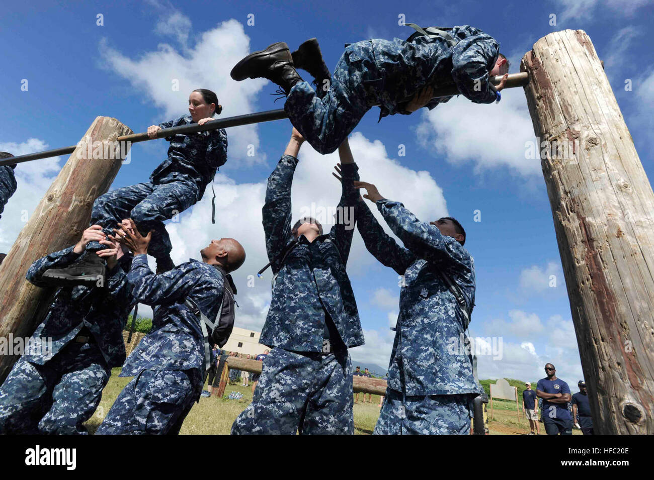 Chief Petty Officer selects work together to complete the obstacle ...