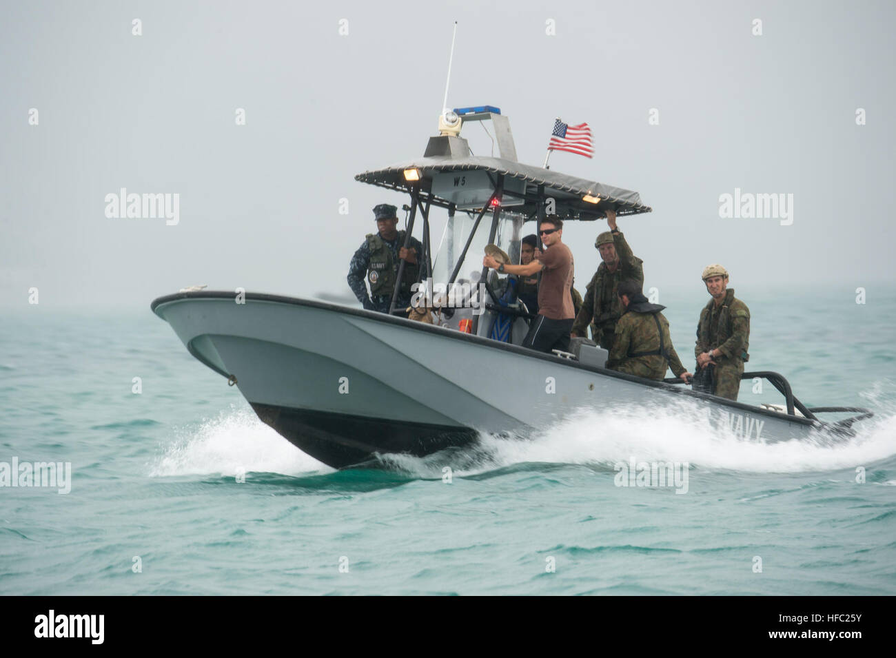 Explosive ordnance disposal (EOD) technicians from Australia and the ...