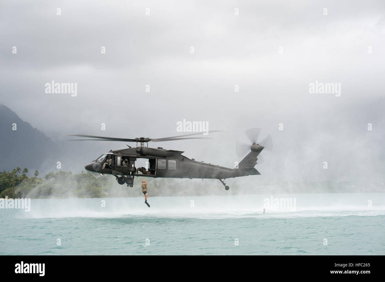A Canadian Navy explosive ordnance disposal (EOD) technician, assigned ...