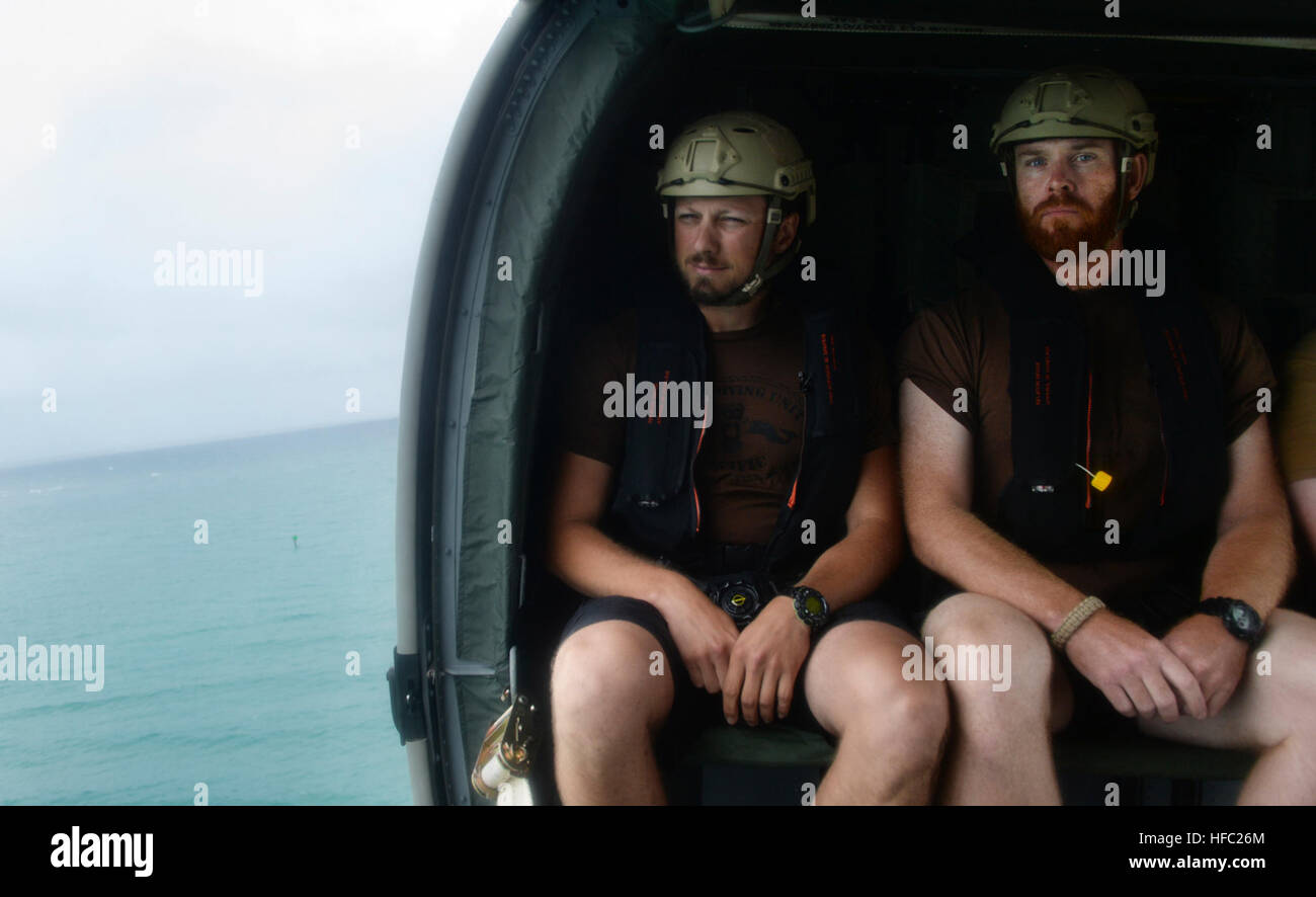 Canadian explosive ordnance disposal (EOD) technicians await the signal ...