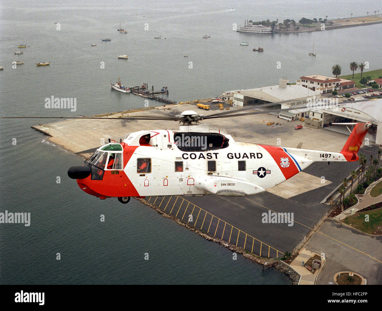 Air-to-air left side view of a Coast Guard HH-3F Pelican helicopter. HH ...