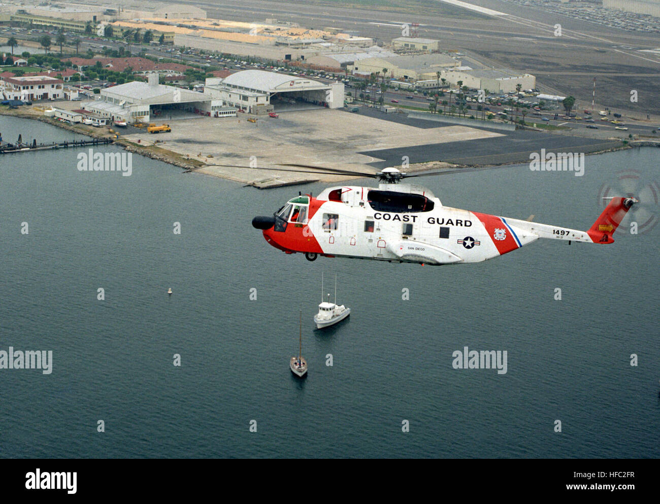 Air-to-air left side view of a Coast Guard HH-3F Pelican helicopter. HH ...