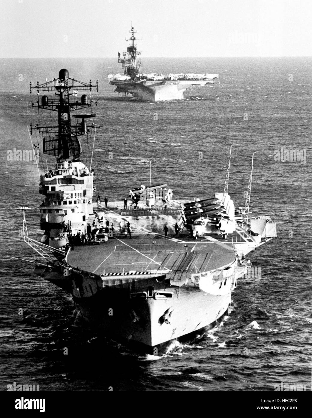 HMAS Melbourne (R21) and USS Midway (CV-41) underway, demonstrating ...