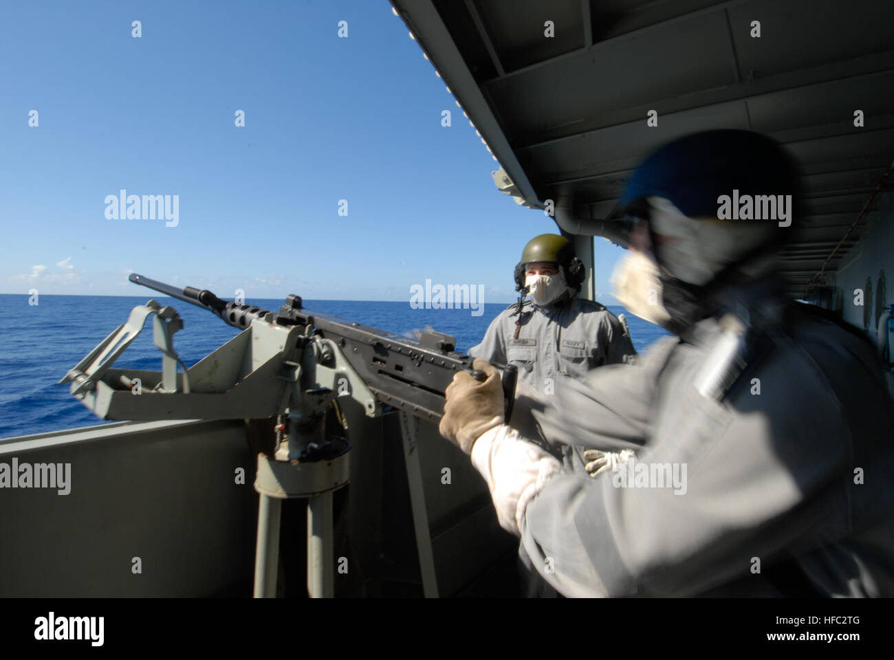 HMAS Tobruk- A Royal Australian Navy sailor performs defensive manuvers ...