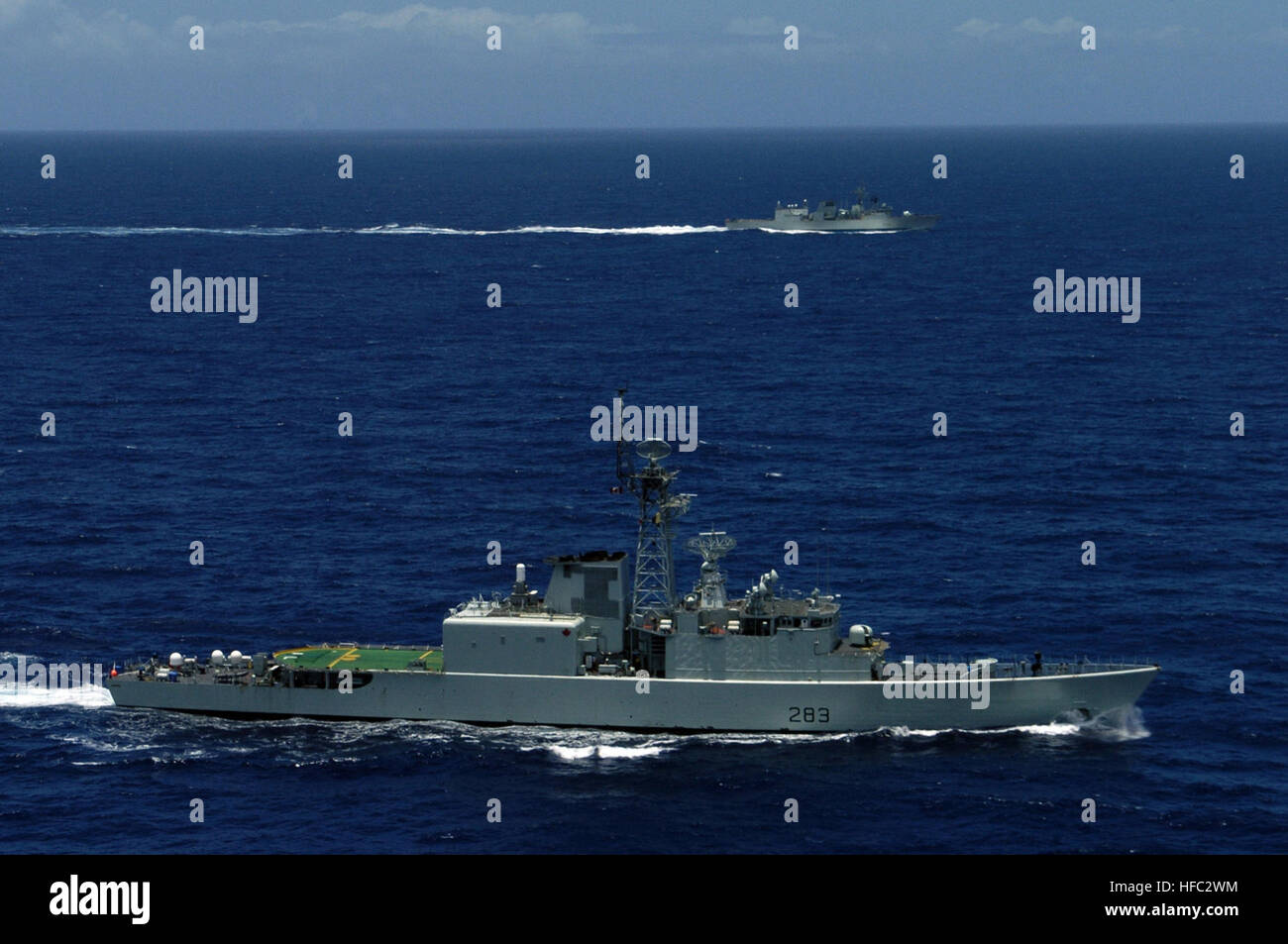 HMCS Algonquin (DDG 283), front, and HMCS Regina (FFG 334) are under ...