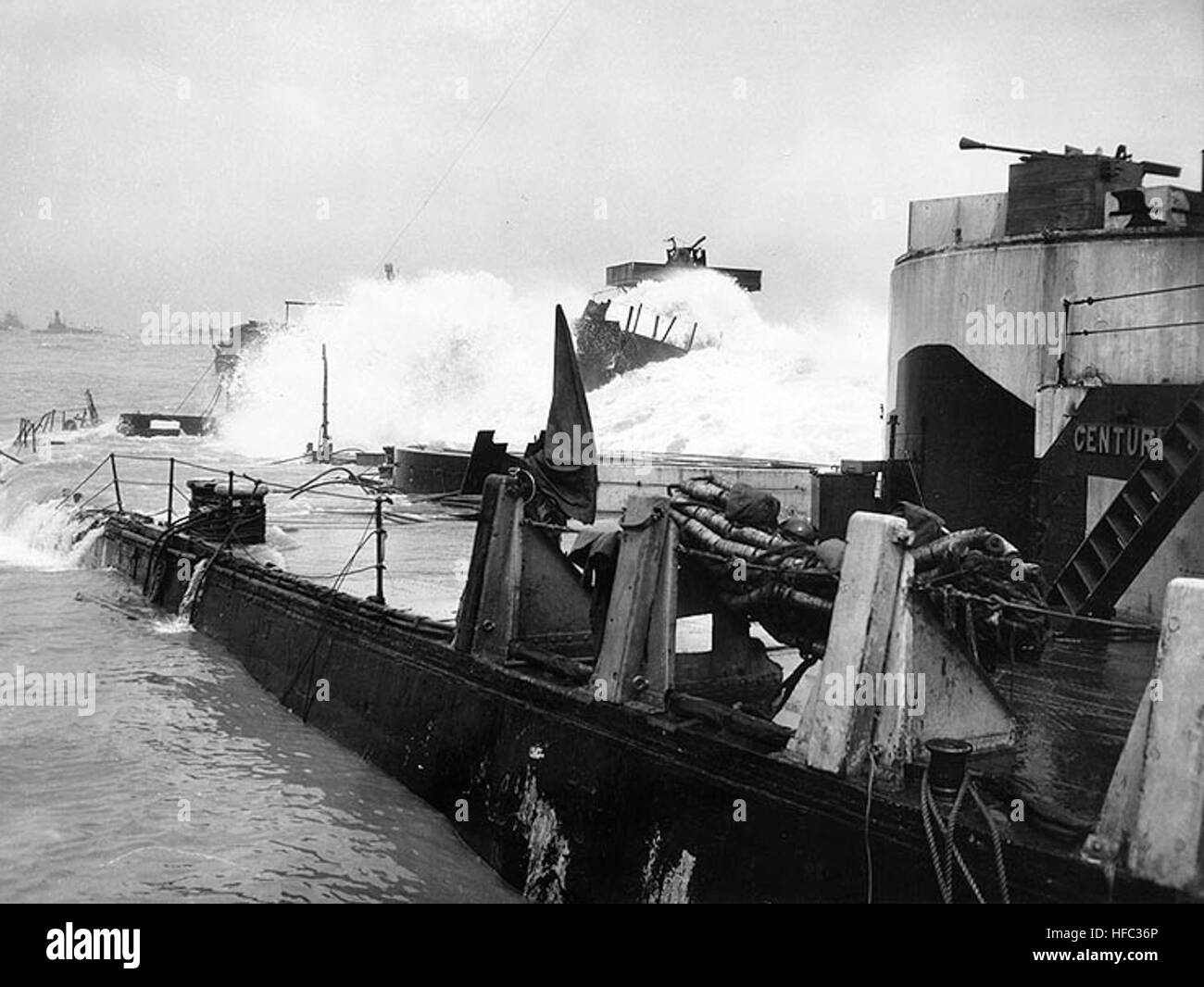 HMS Centurion as breakwater during storm off Omaha Beach in June 1944 ...