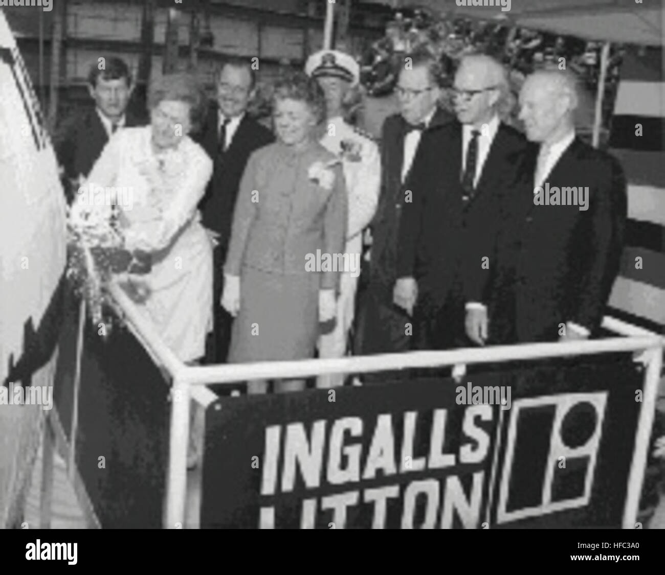 A naval vessel is formally christened, marking its official entry into ...
