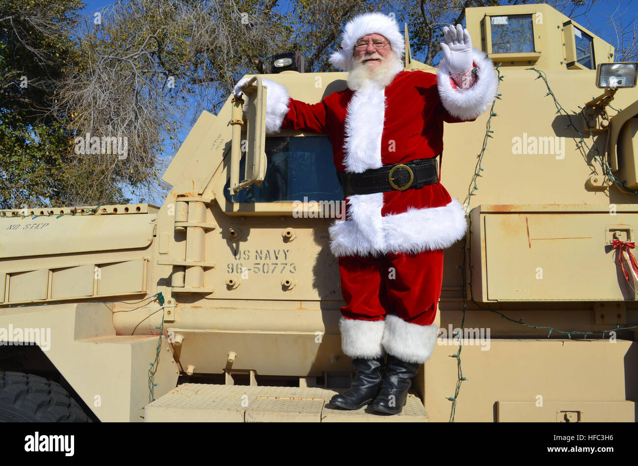 Santa climbs on board a joint EOD rapid response vehicle (JERRV) for ...