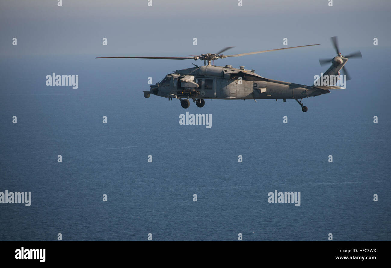 An MH-60S Seahawk helicopter attached to Helicopter Sea Combat Squadron ...