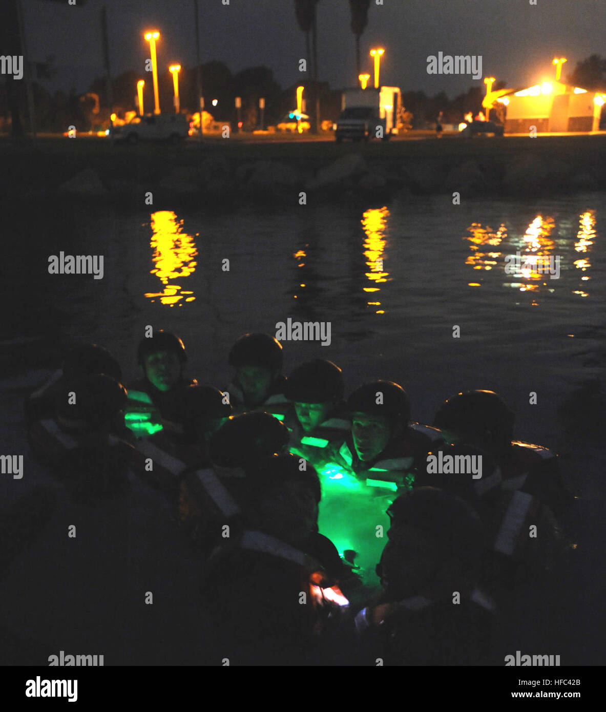 Basic Crewman Training students huddle in a swimming circle in Mission ...