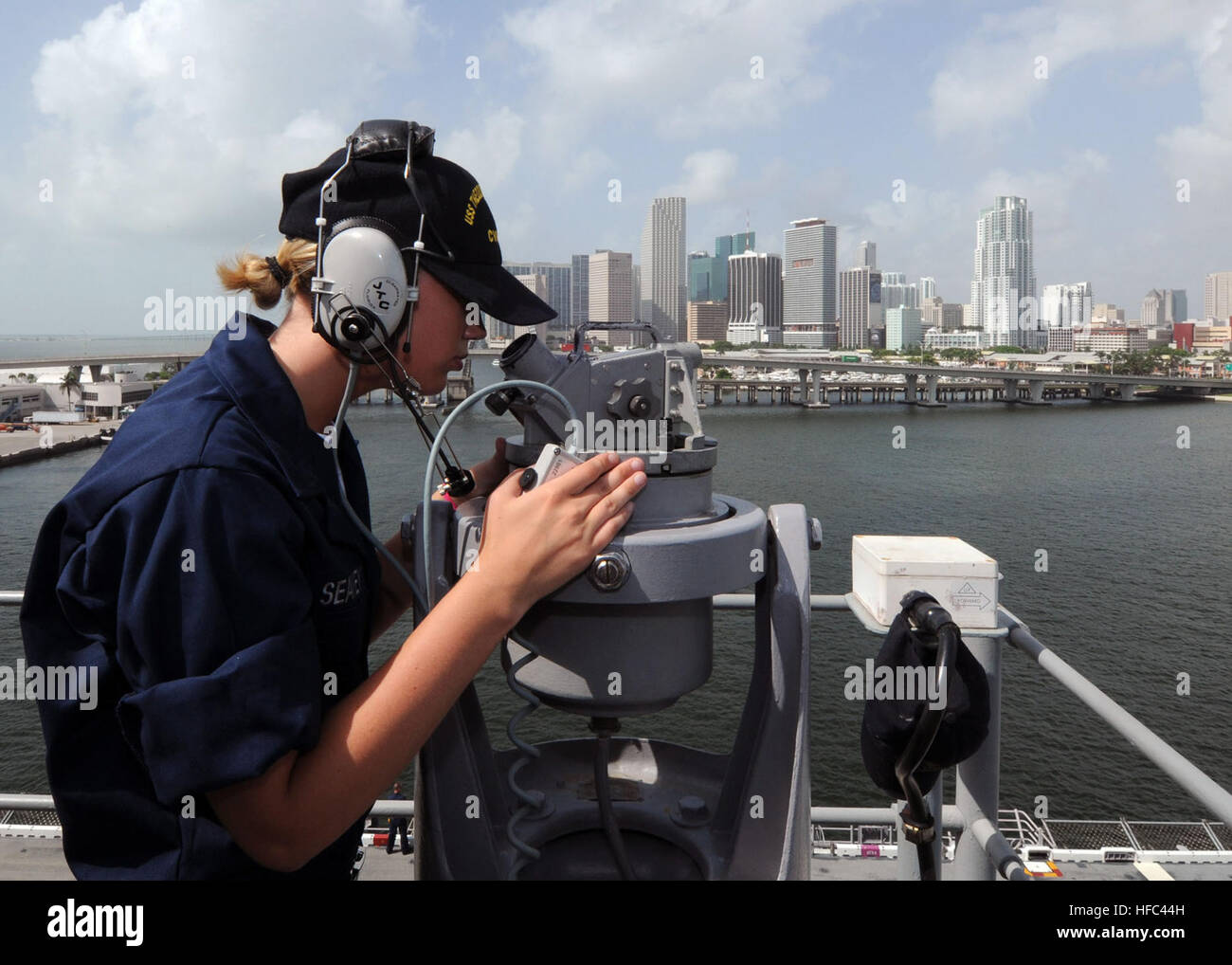 Seaman Apprentice Katie A. Seavey, quartermaster, uses a telescopic ...
