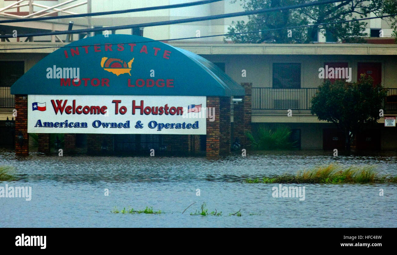 A "Welcome to Houston" sign at the Interstate Motor Lodge is visible in ...