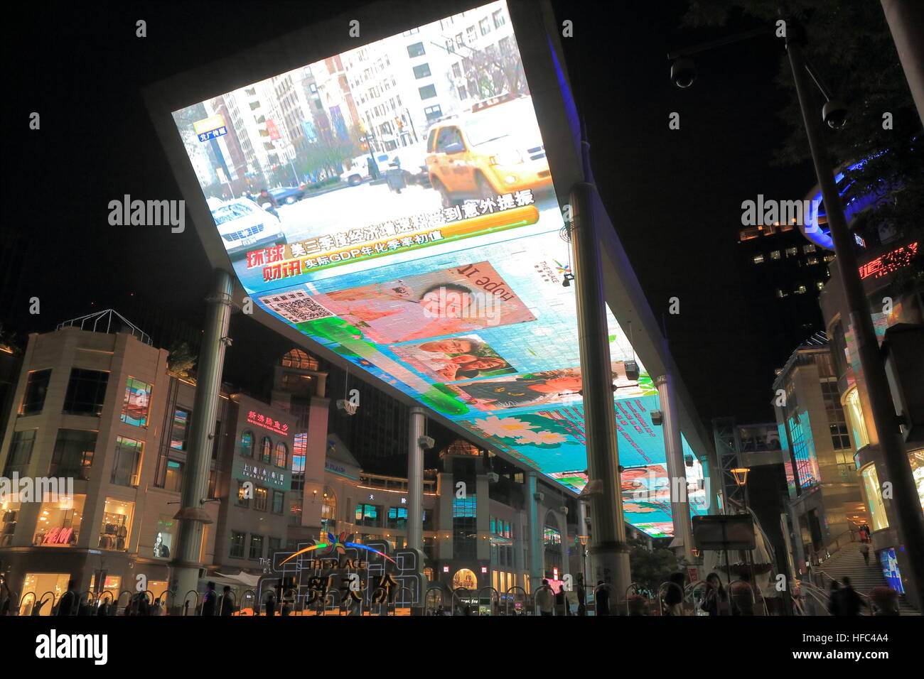 People visit The Place shopping mall in Beijing China. The Place is ...