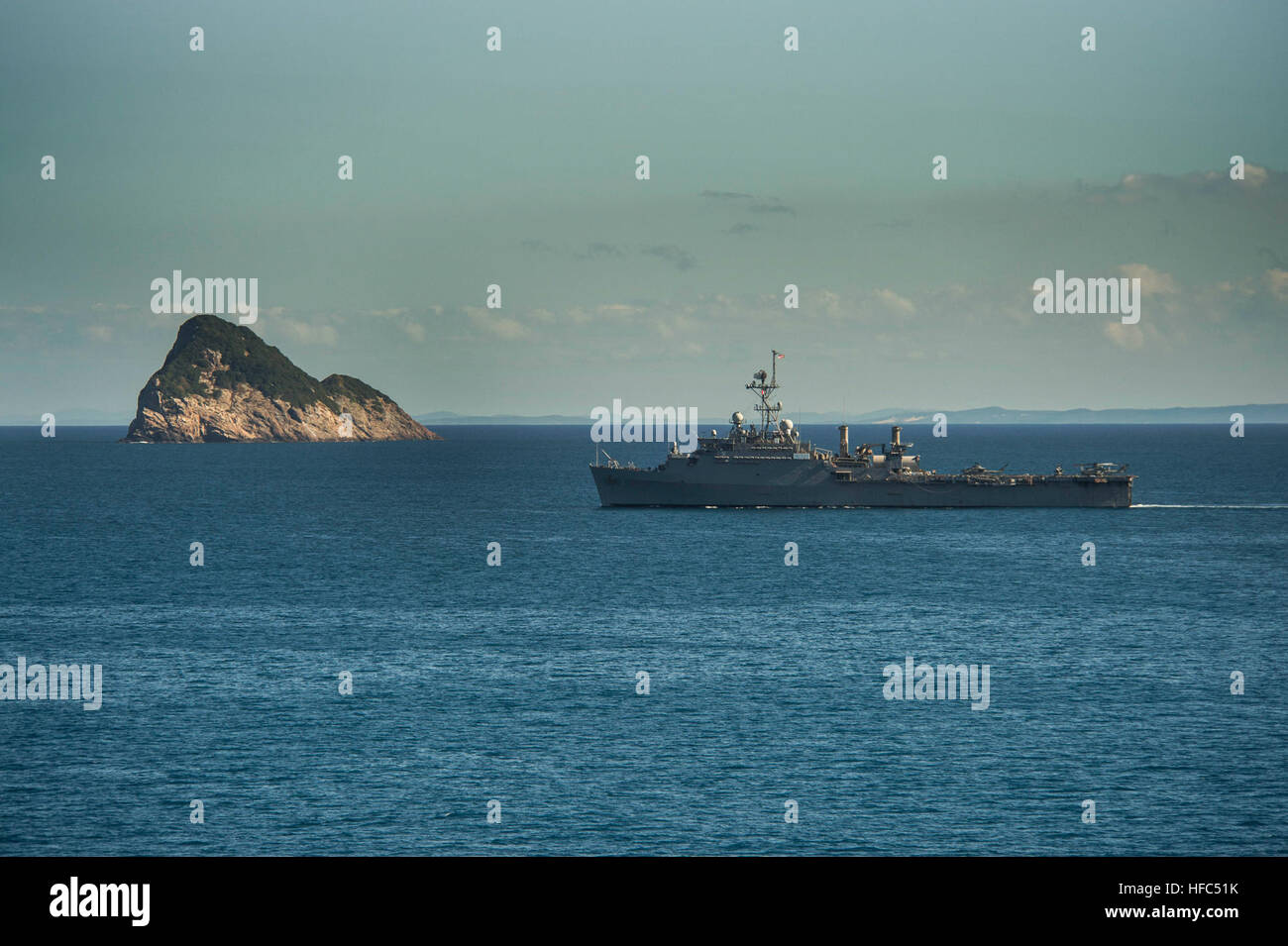 The amphibious transport dock ship USS Denver (LPD 9) transits the ...