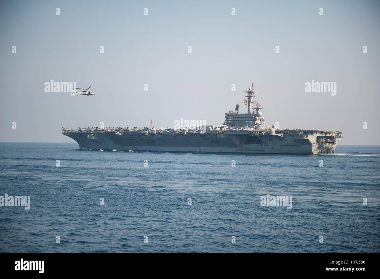The aircraft carrier USS George H.W. Bush (CVN 77) transits the Arabian ...