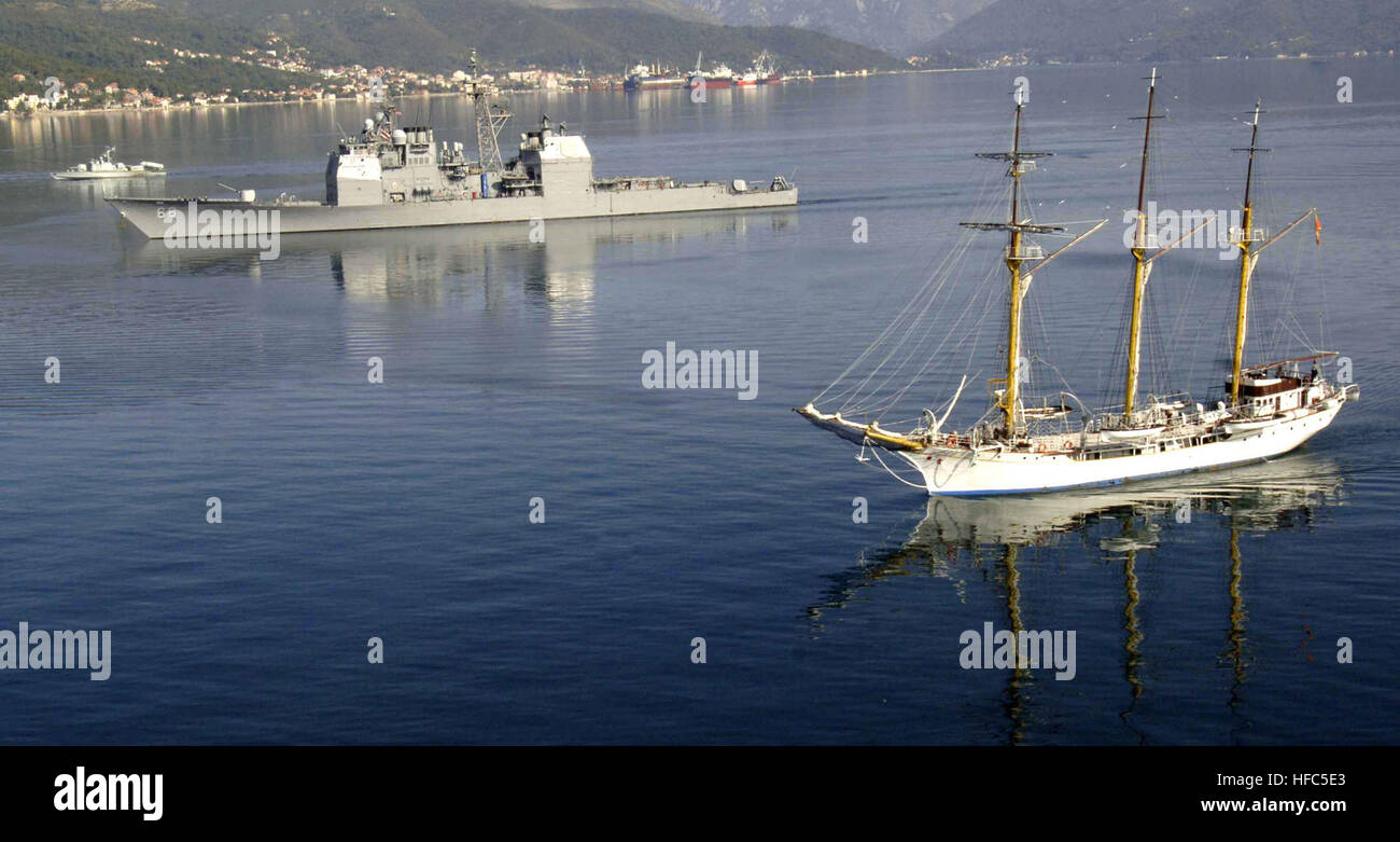 The Montenegrin sail training ship Jadran sails alongside the guided ...