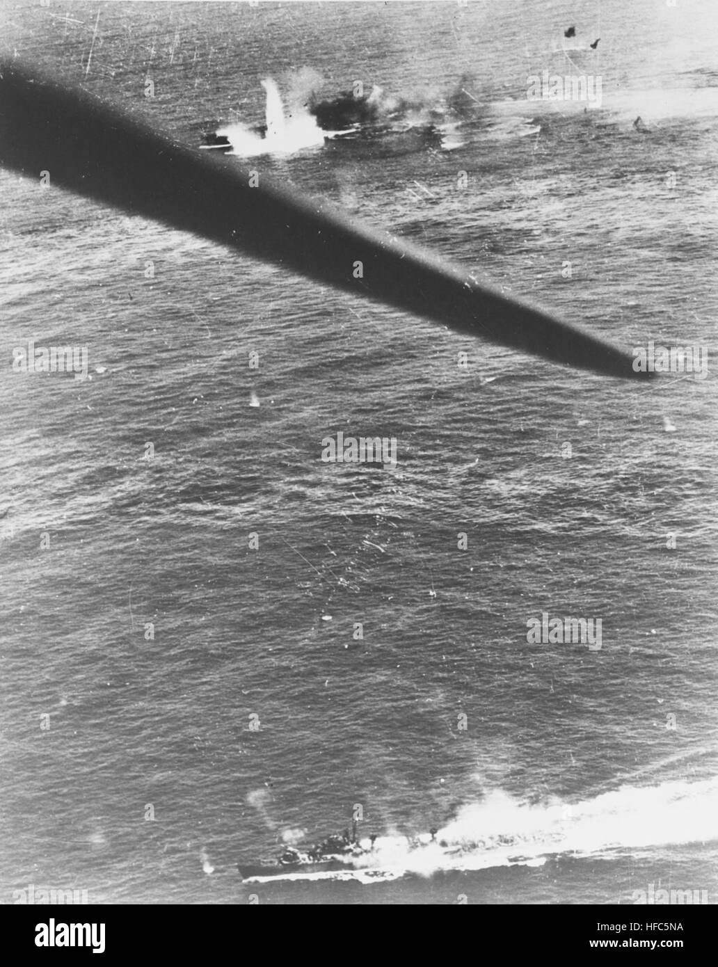 Japanese Matsu-class destroyer and carrier during Battle of Cape Enga ...