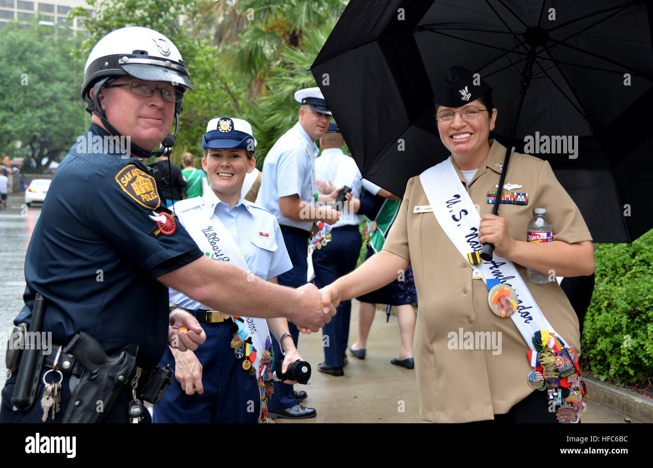 Petty Officer 2nd Class Shantal Zavala greets a San Antonio police ...