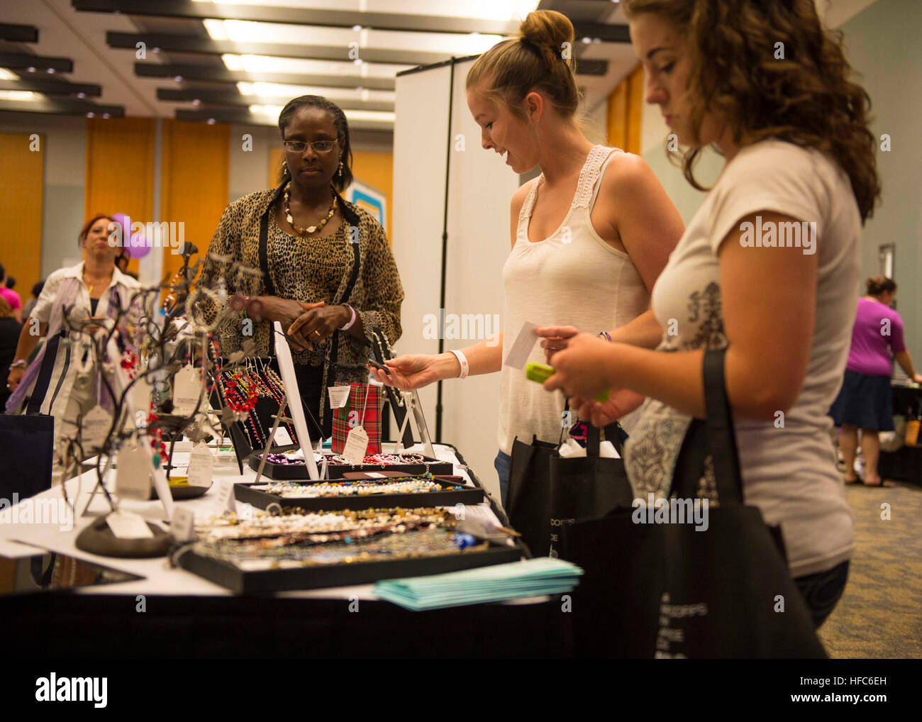 Amanda Hollis and Kyndall Fulmer speak with Shelley Davis (left), a ...