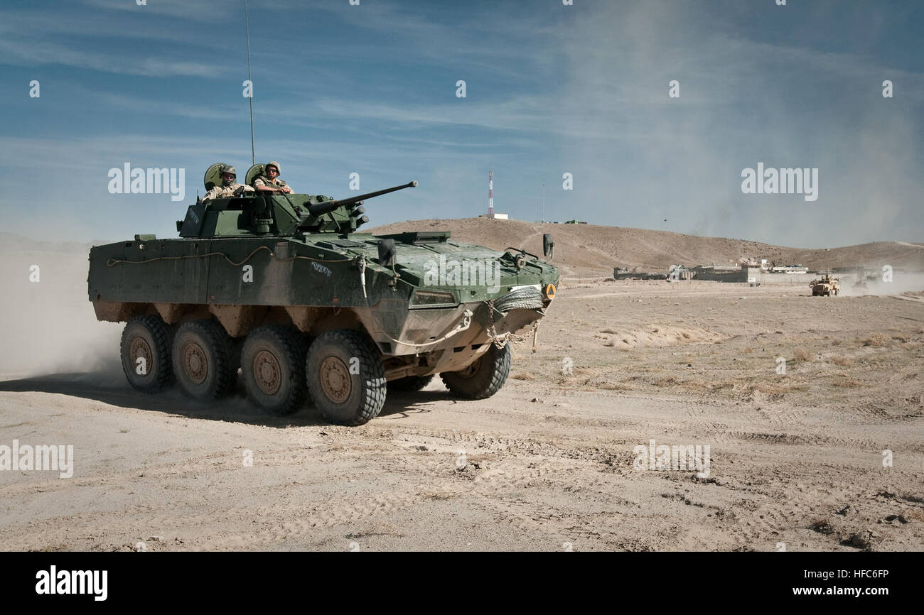 A Polish army "Patria" armored modular vehicle patrols near Camp Giro ...