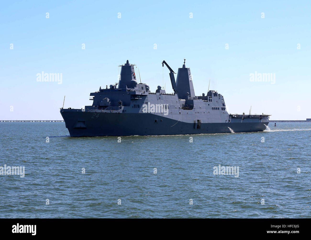 The USS Iwo Jima (LHD-7) travels through the water as it prepares to ...