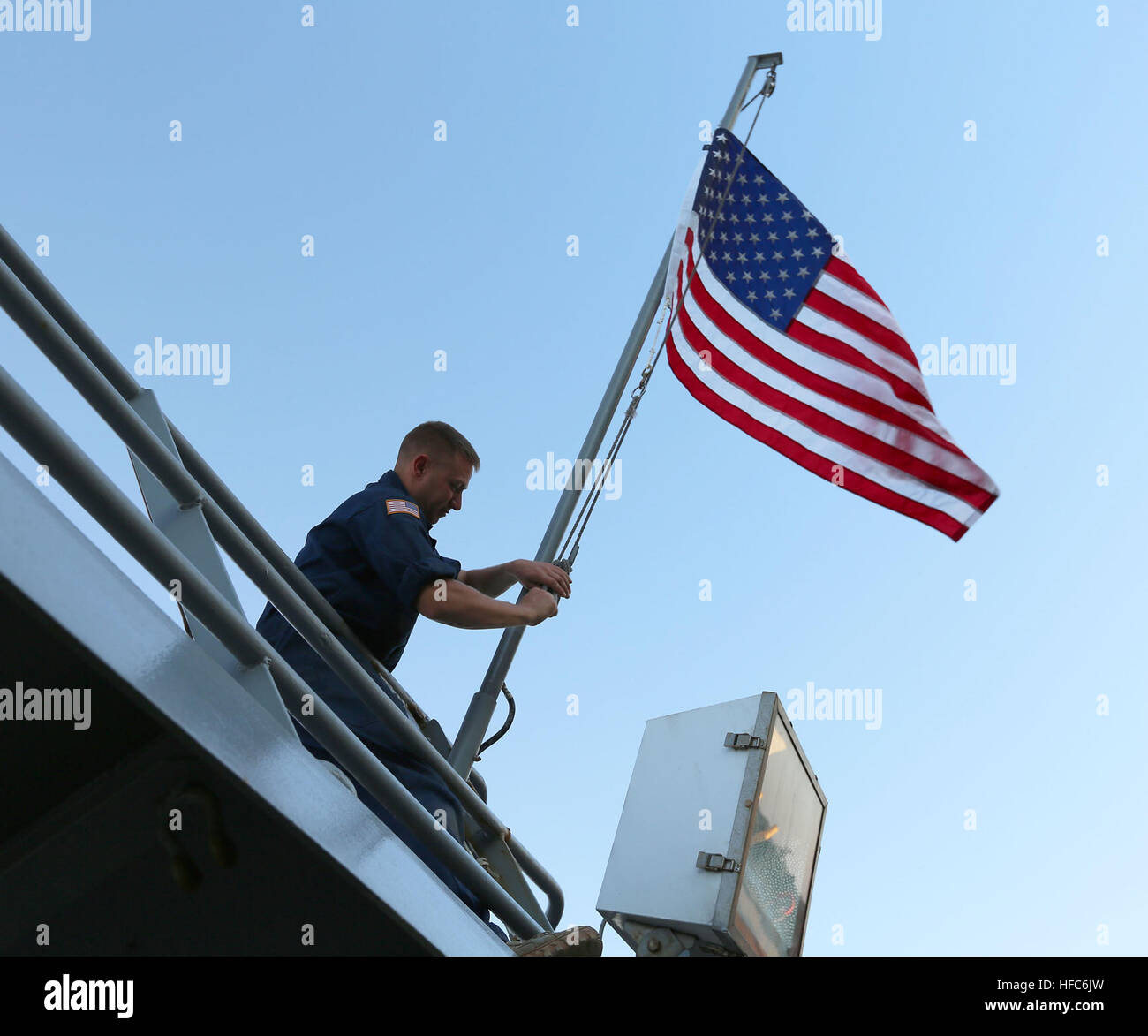 A U.S. Army watercraft operator aboard the landing craft USS Hobkirk ...