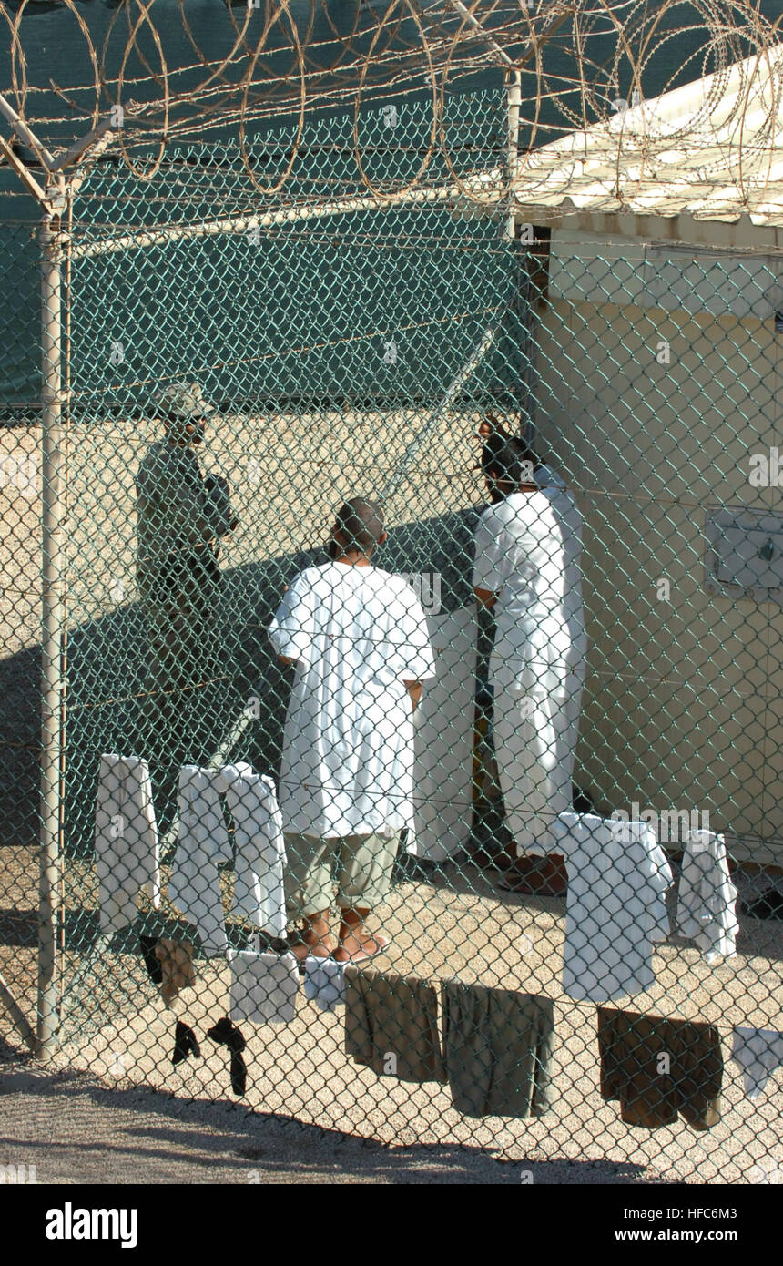 A Navy guard interacts with detainees at Camp 4, Joint Task Force ...
