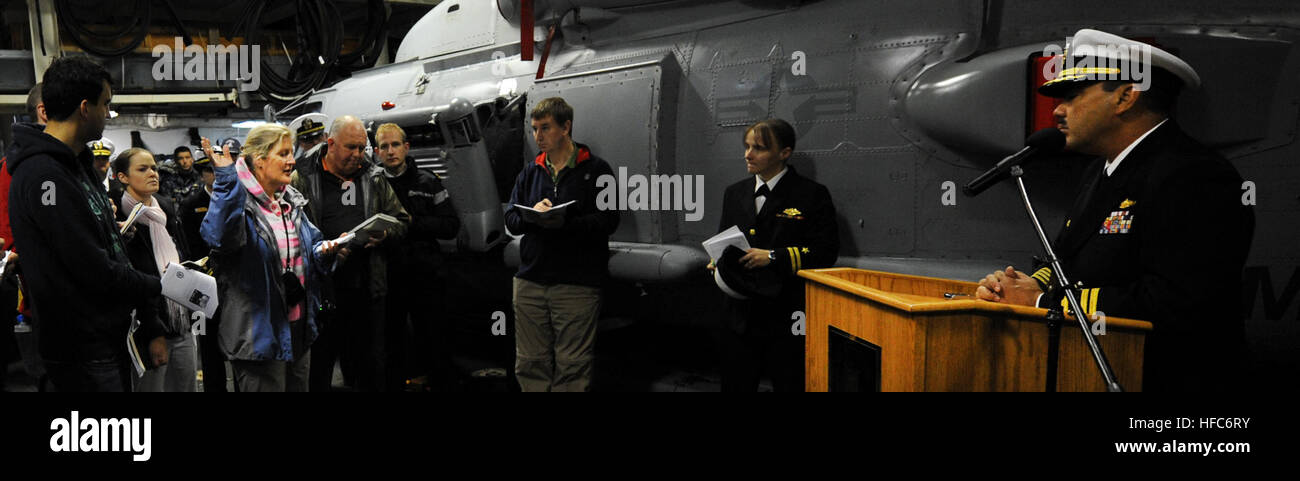 U.S. Navy Capt. Nelson Castro, right, the commander of Destroyer ...