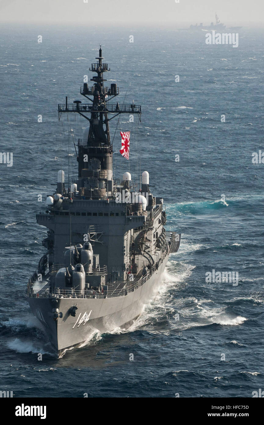 EAST CHINA SEA (June 21, 2012) – JS Kurama (DDH-144) steams into ...