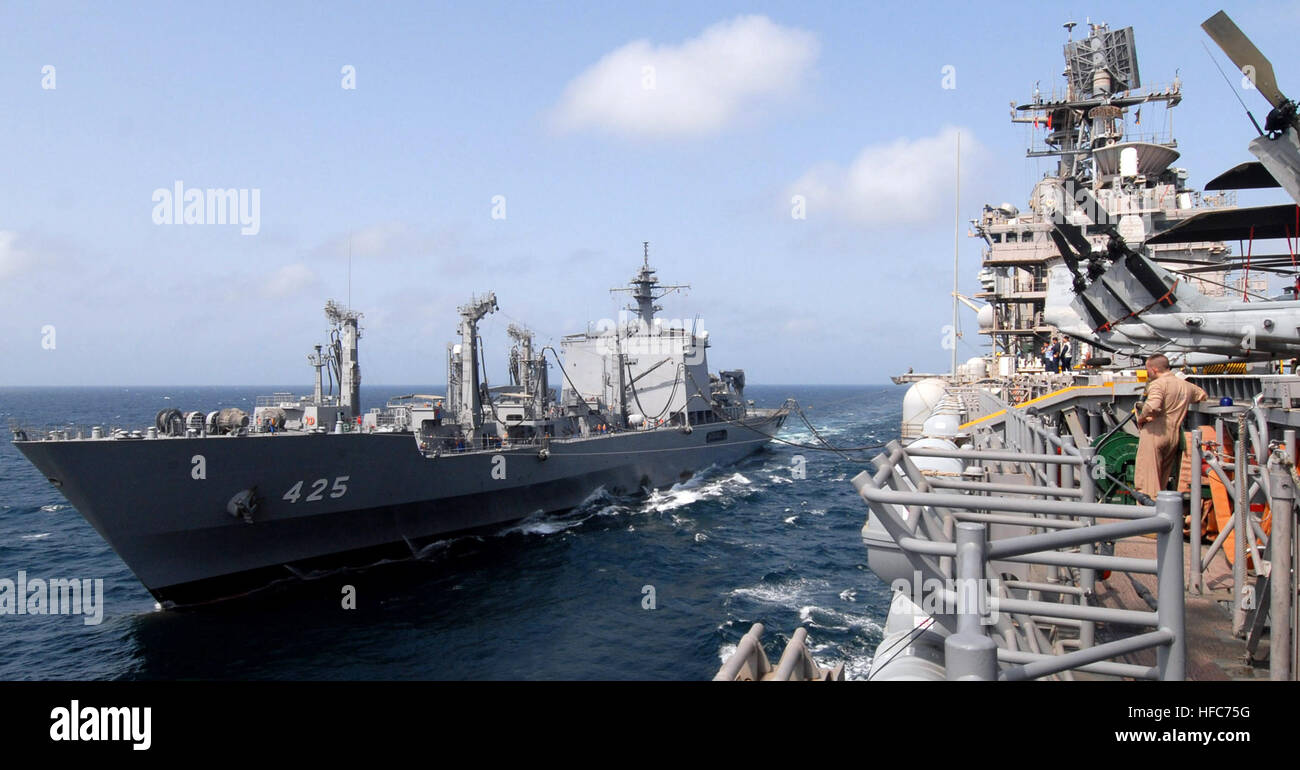 The Japanese Defense Ship, Mashu Class Oiler JDS MASHU (AOE 425) pulls ...