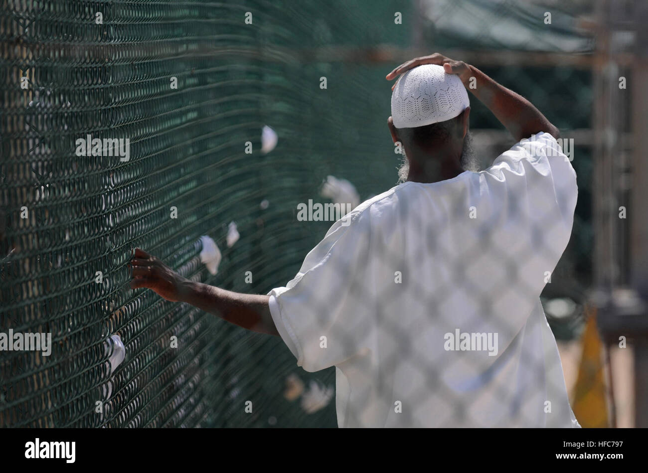 A detainee stands in an outdoor recreation yard at Joint Task Force ...