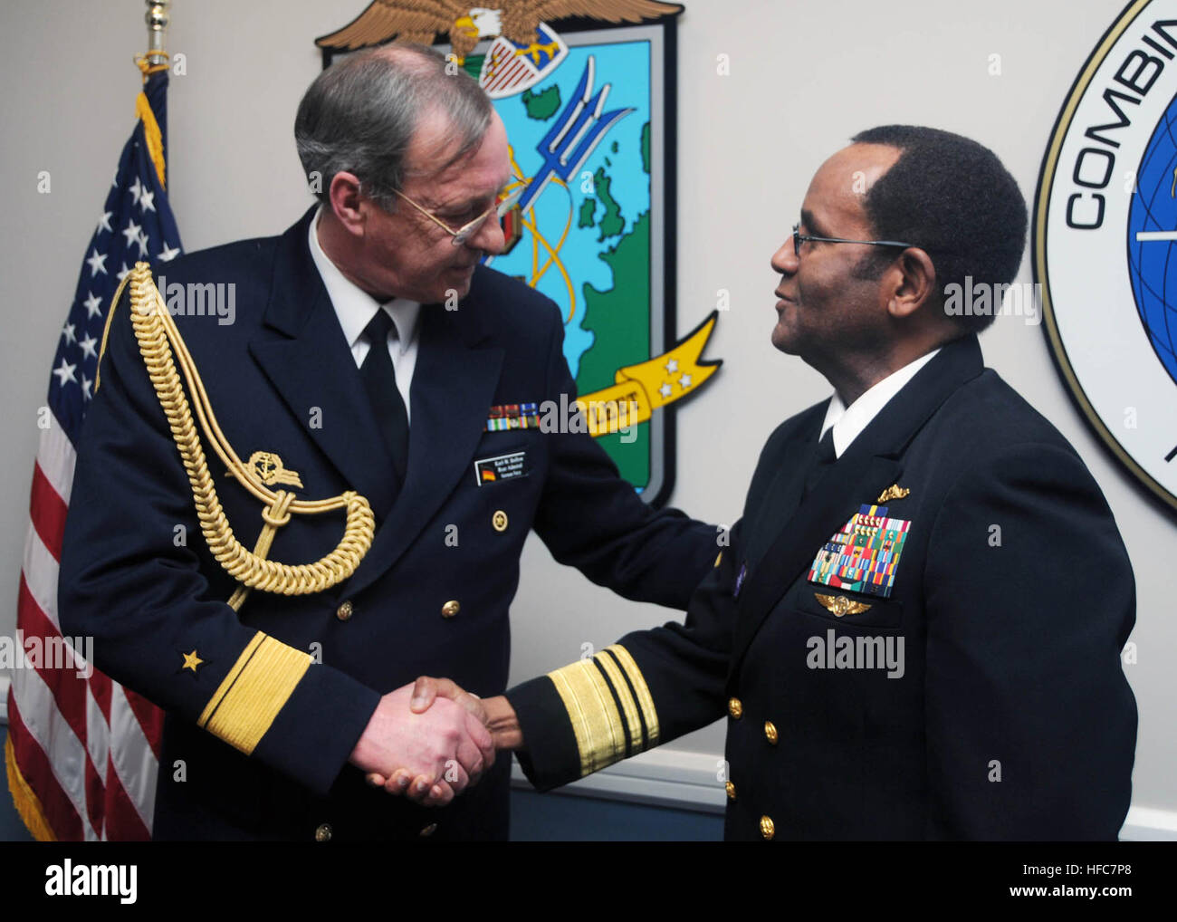 German navy Rear Adm. Karl-Wilhelm Bollow, left, German defense attache ...