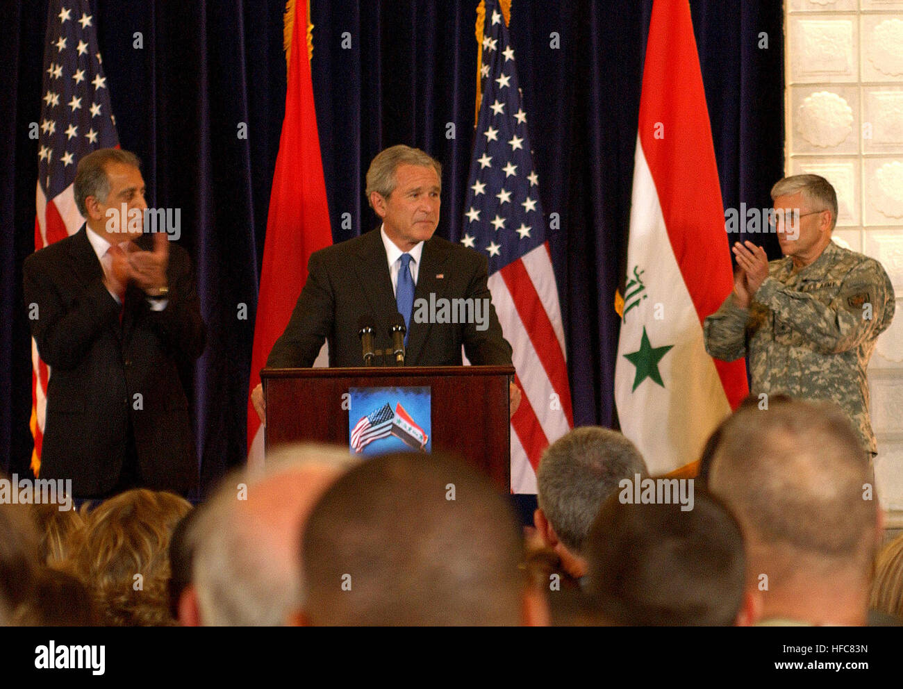 Zalmay Khalilzad, left, U.S. Ambassador to Iraq, and Gen. George Casey ...