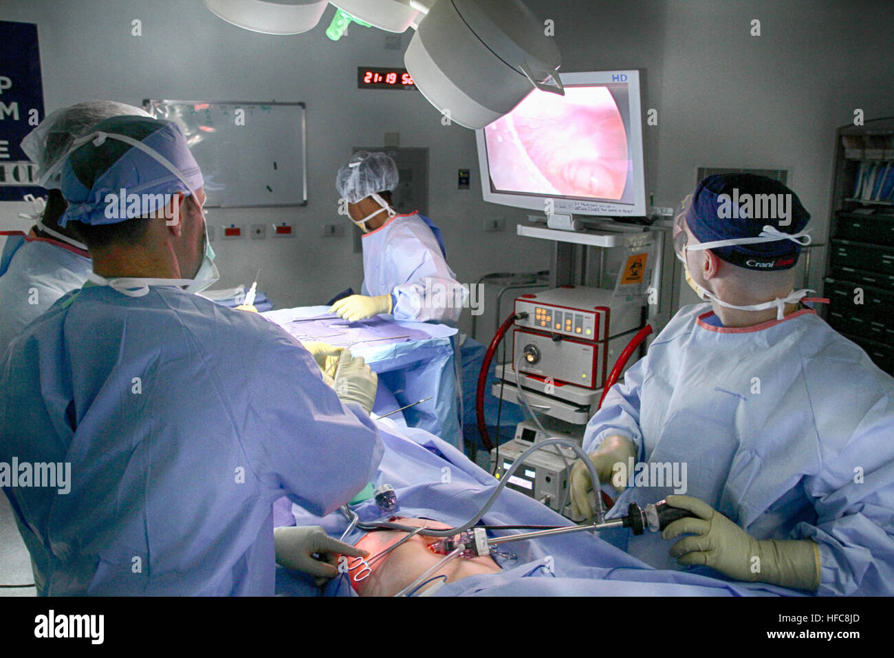 Lt. Cmdr. Jack Brandau, a general surgeon, and Lt. Cmdr. Matthew ...