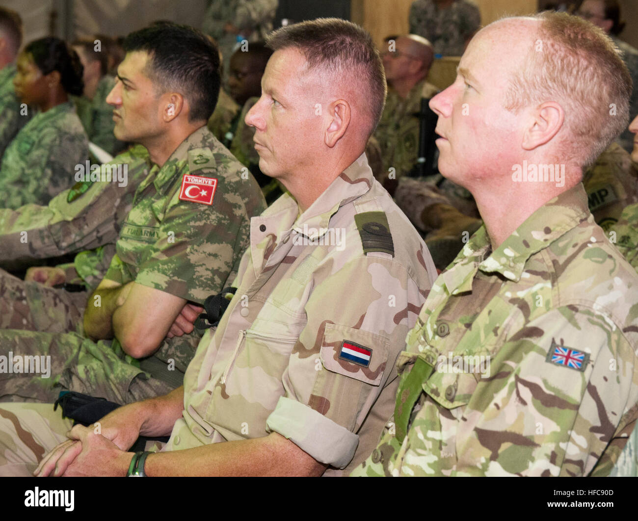 A Turkish, a Netherlandish and a British officer sit side by side as ...
