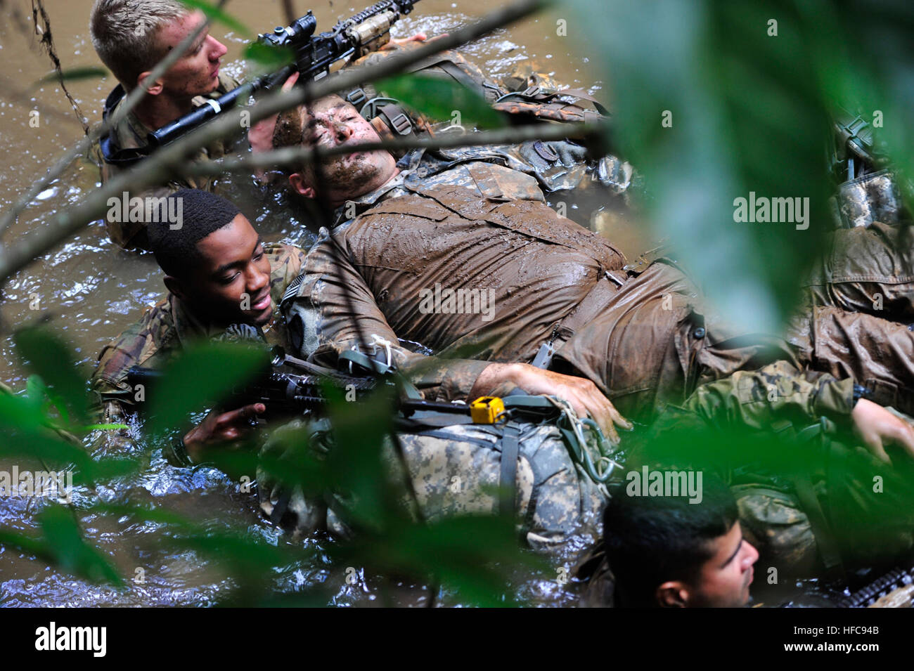 Students utilize a ruck raft to transport a simulated casualty during ...