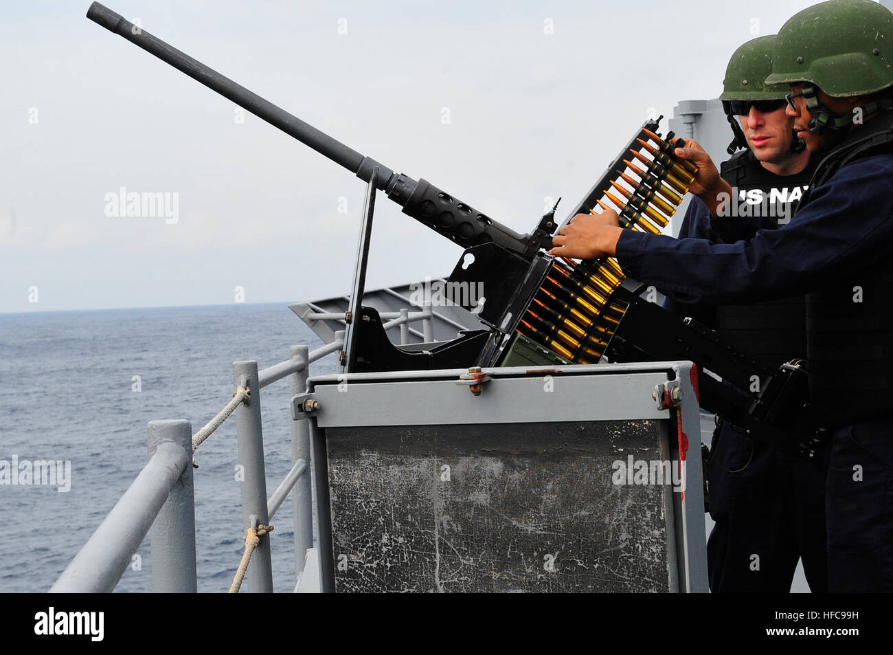 Navy loads 50 caliber machine gun hi-res stock photography and images ...