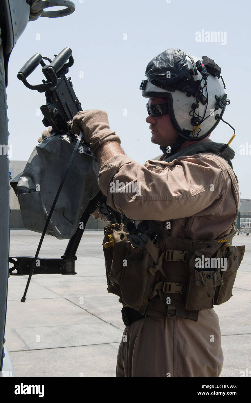 A naval aircrewman assigned to Helicopter Sea Combat Squadron 26 (HSC ...