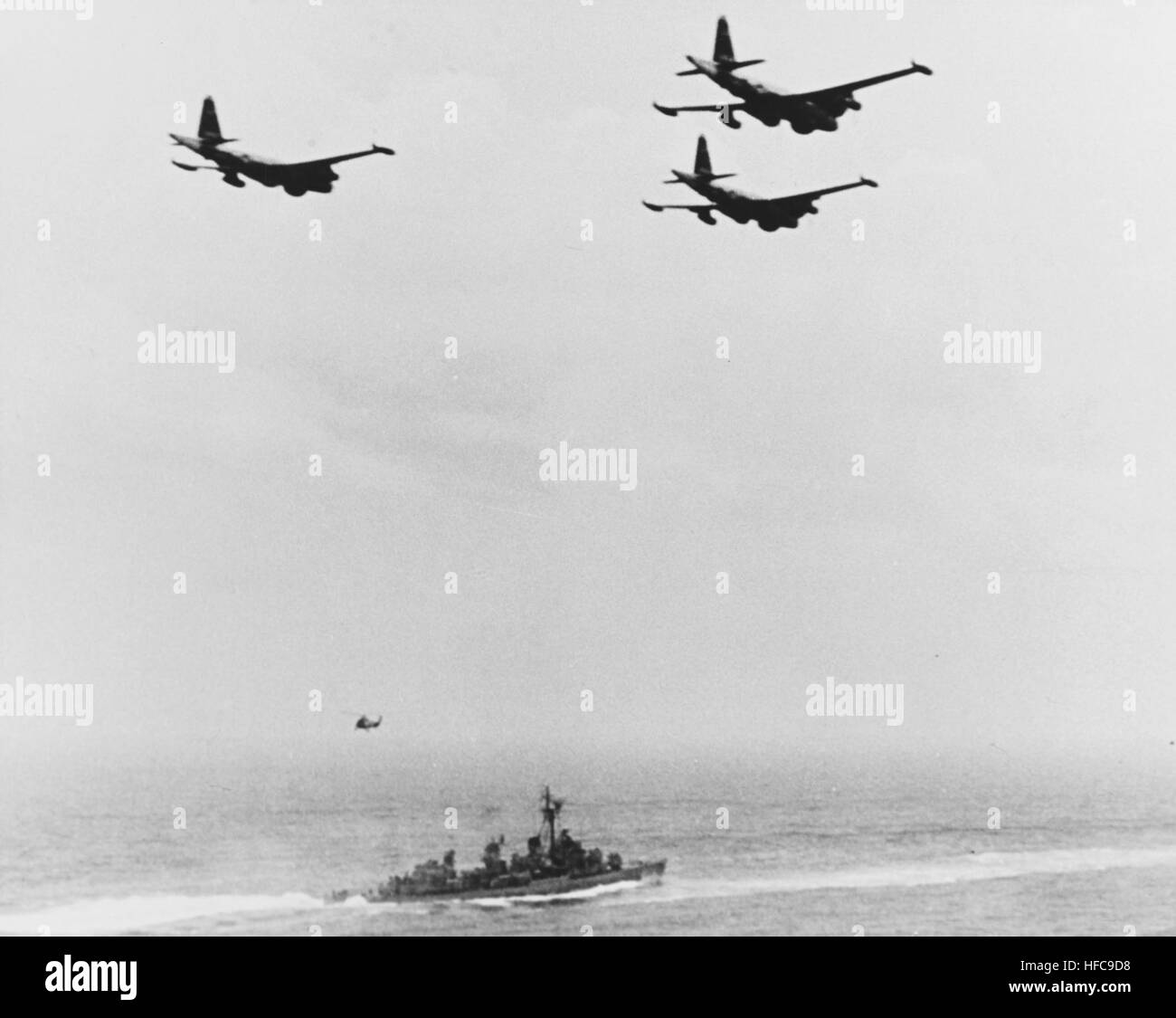 Lockheed P2V Neptune aircraft operate alongside a Fletcher-class ...