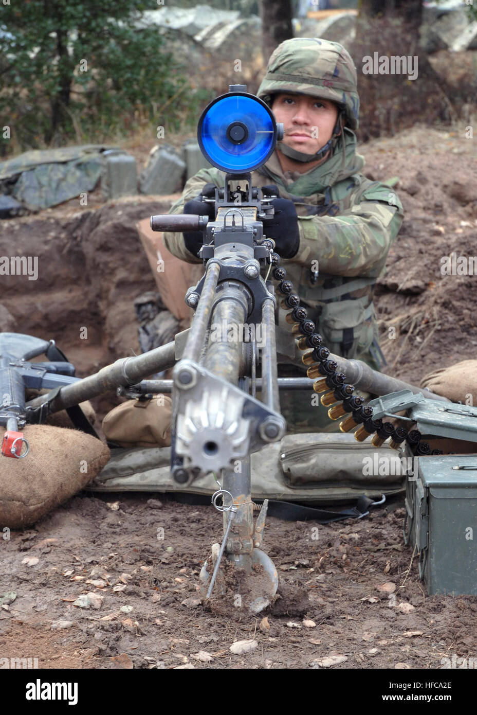 The M2 .50 caliber machine gun is a heavy machine gun used aboard ships ...