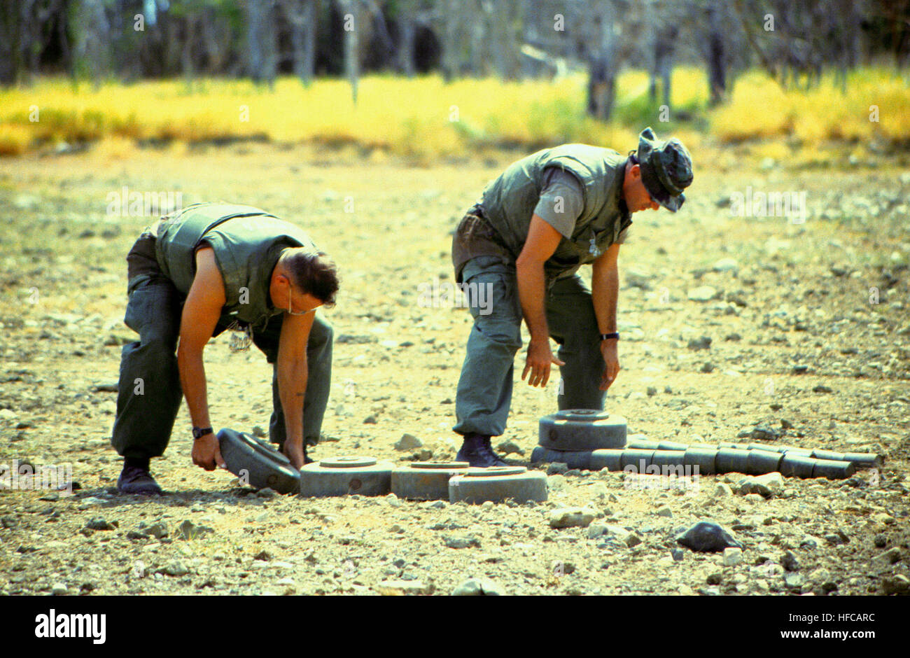 Marines stack mines for disposal Stock Photo - Alamy