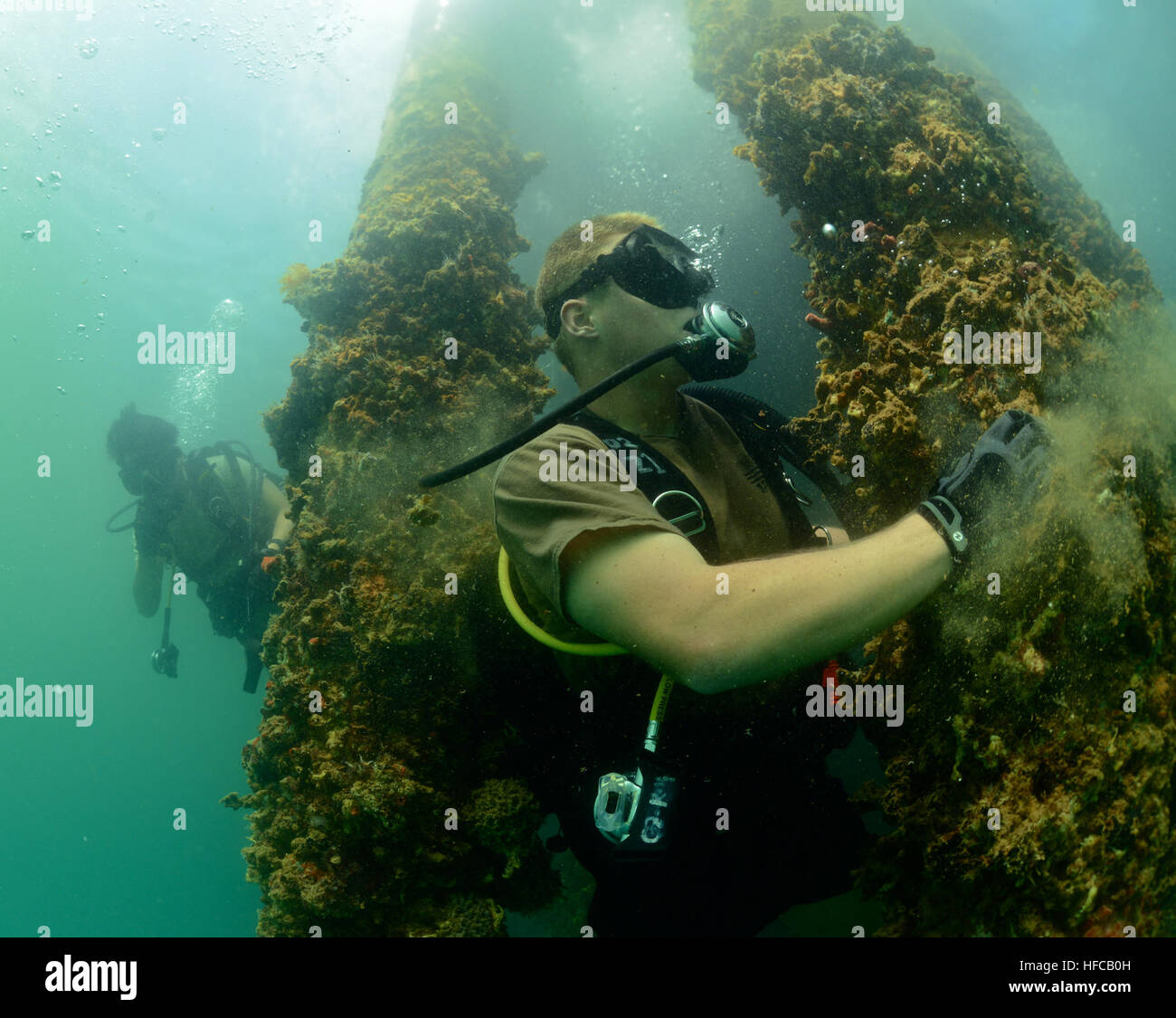 U.S. Navy Ensign Mike Johnston, an explosive ordnance disposal (EOD ...