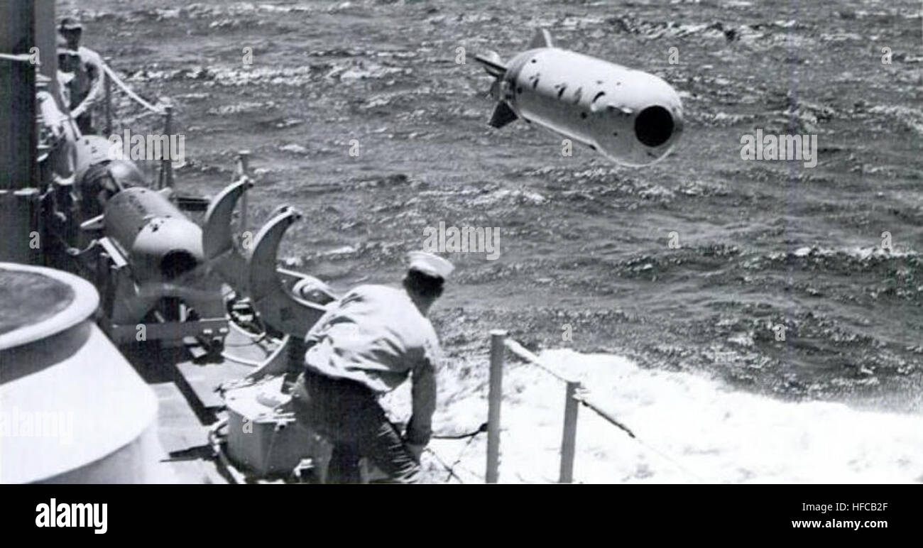 A Mark 32 torpedo is deployed using a Mark 2 torpedo thrower ...