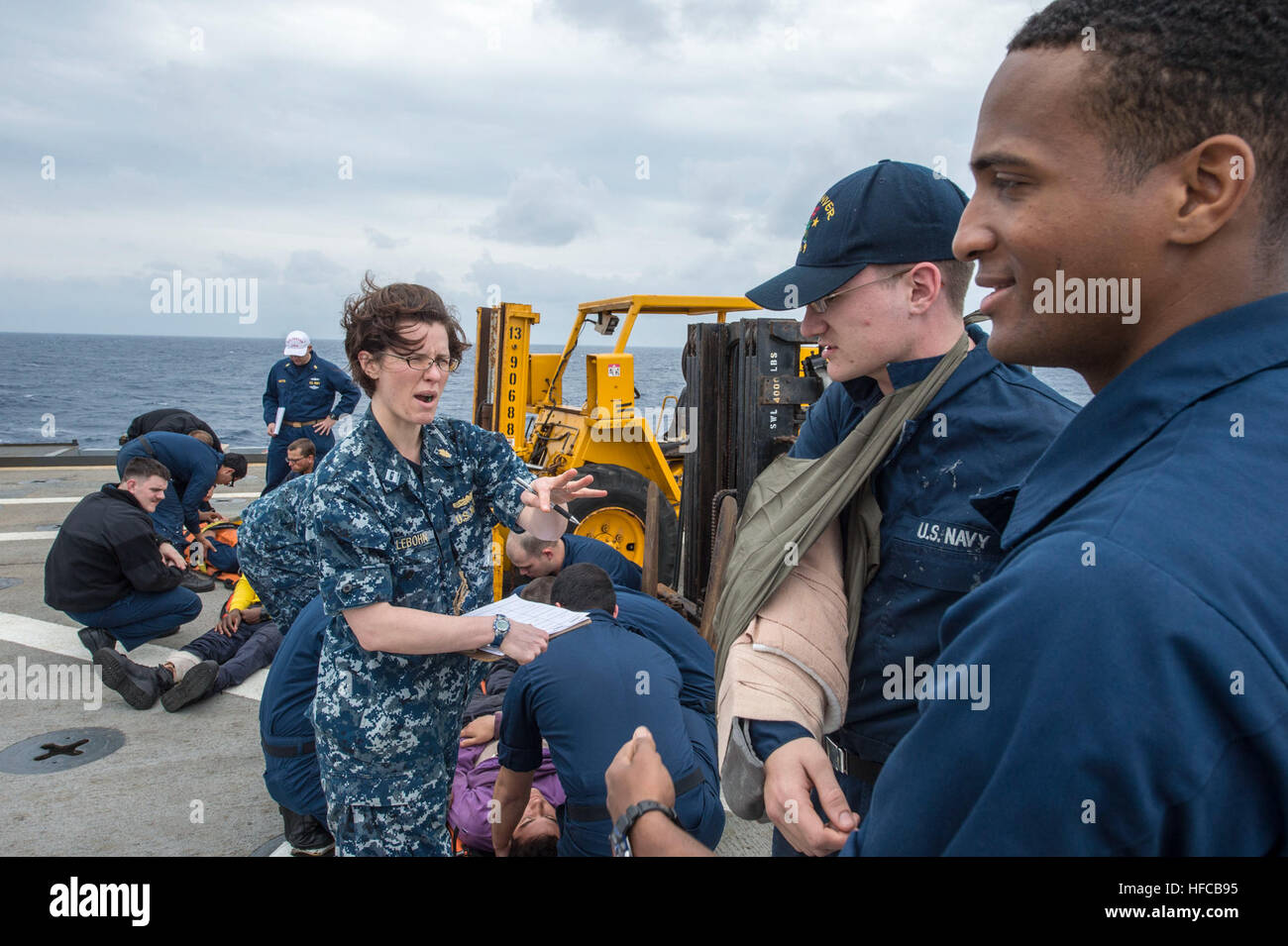 Dental Officer Lt. Rachel Dulebohn, gives instructions on how to handle ...