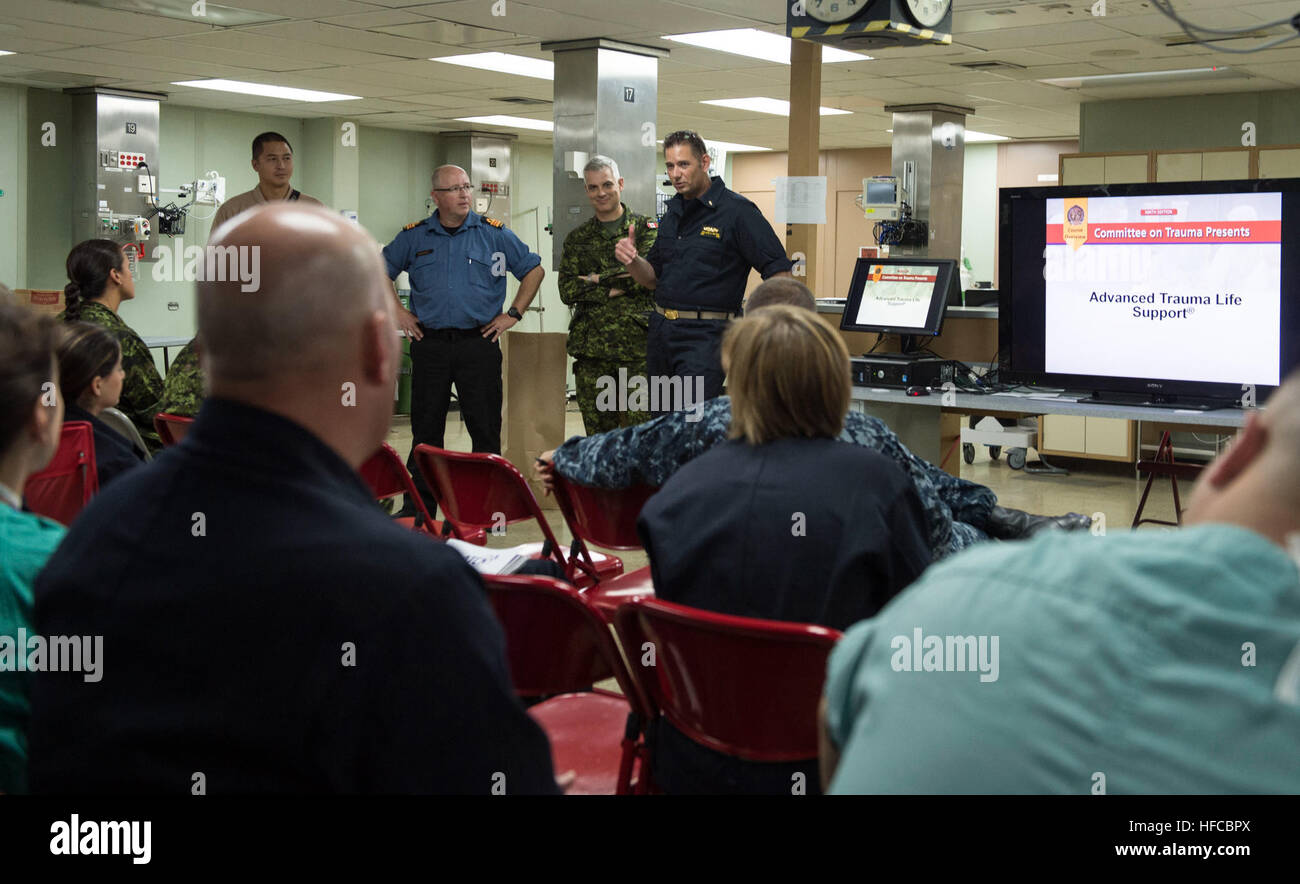 U.S. Navy Cmdr. William Dutton, center, advanced trauma life support ...