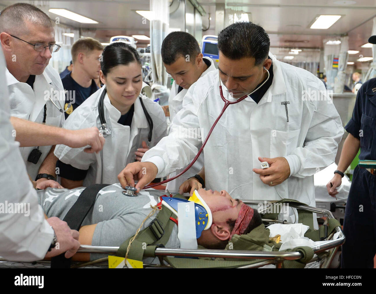 PHILIPPINE SEA (July 16, 2015) Crew members on board the hospital ship ...