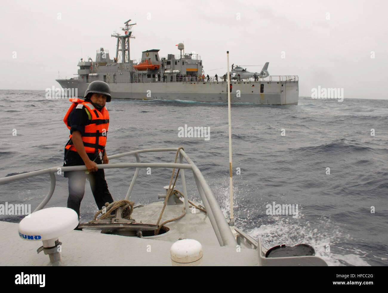 OFF CALABASH CAY, Belize, (June 18, 2015) A boarding team from the ...